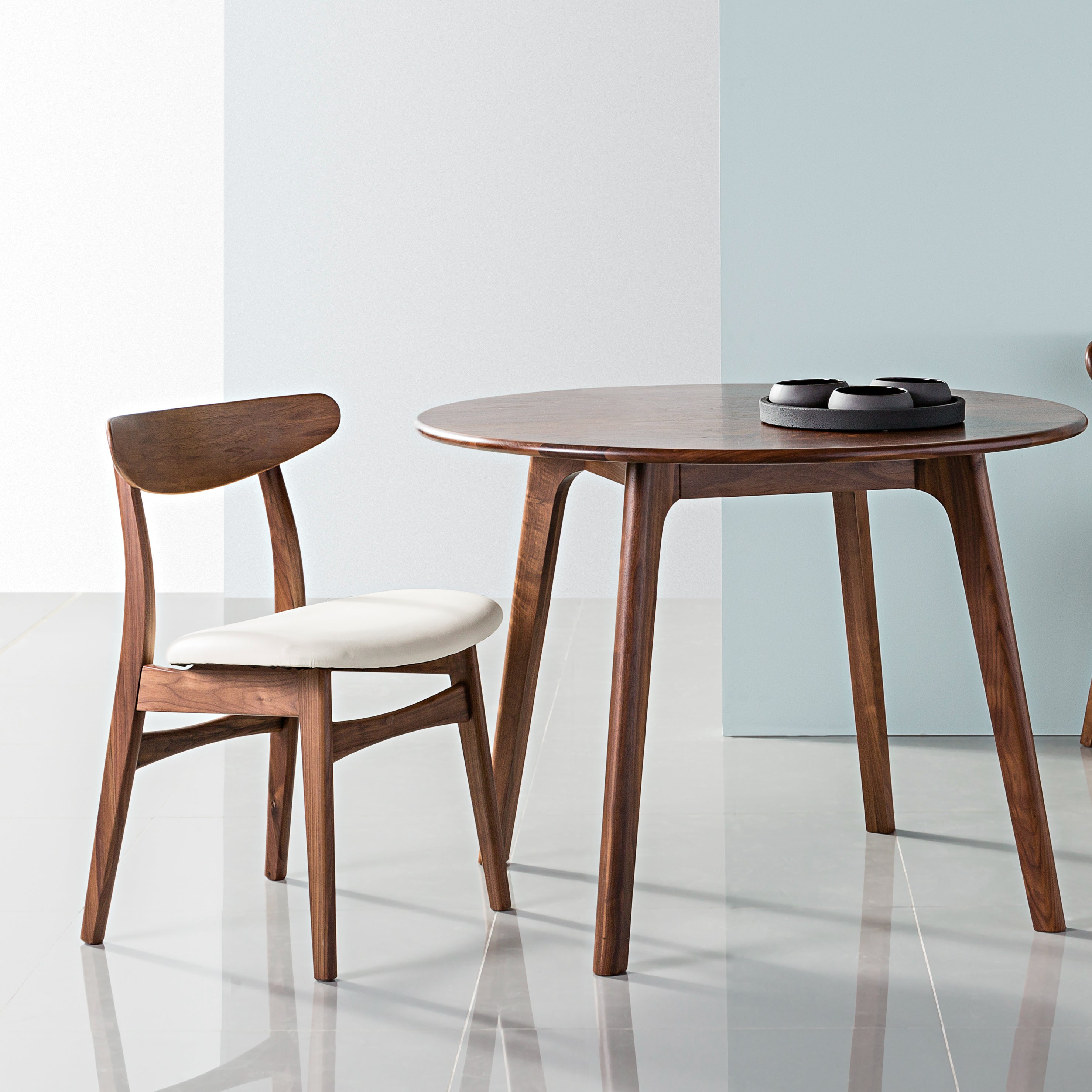 Buy Magnus Round Dining Table in Solid Walnut | IconByDesign
