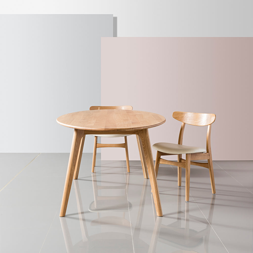 Buy Magnus Oval Dining Table in Solid Oak | IconByDesign